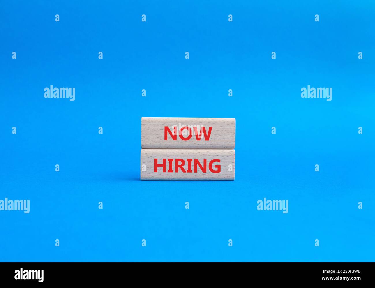Now Hiring symbol. Concept word Now Hiring on wooden blocks. Beautiful ...
