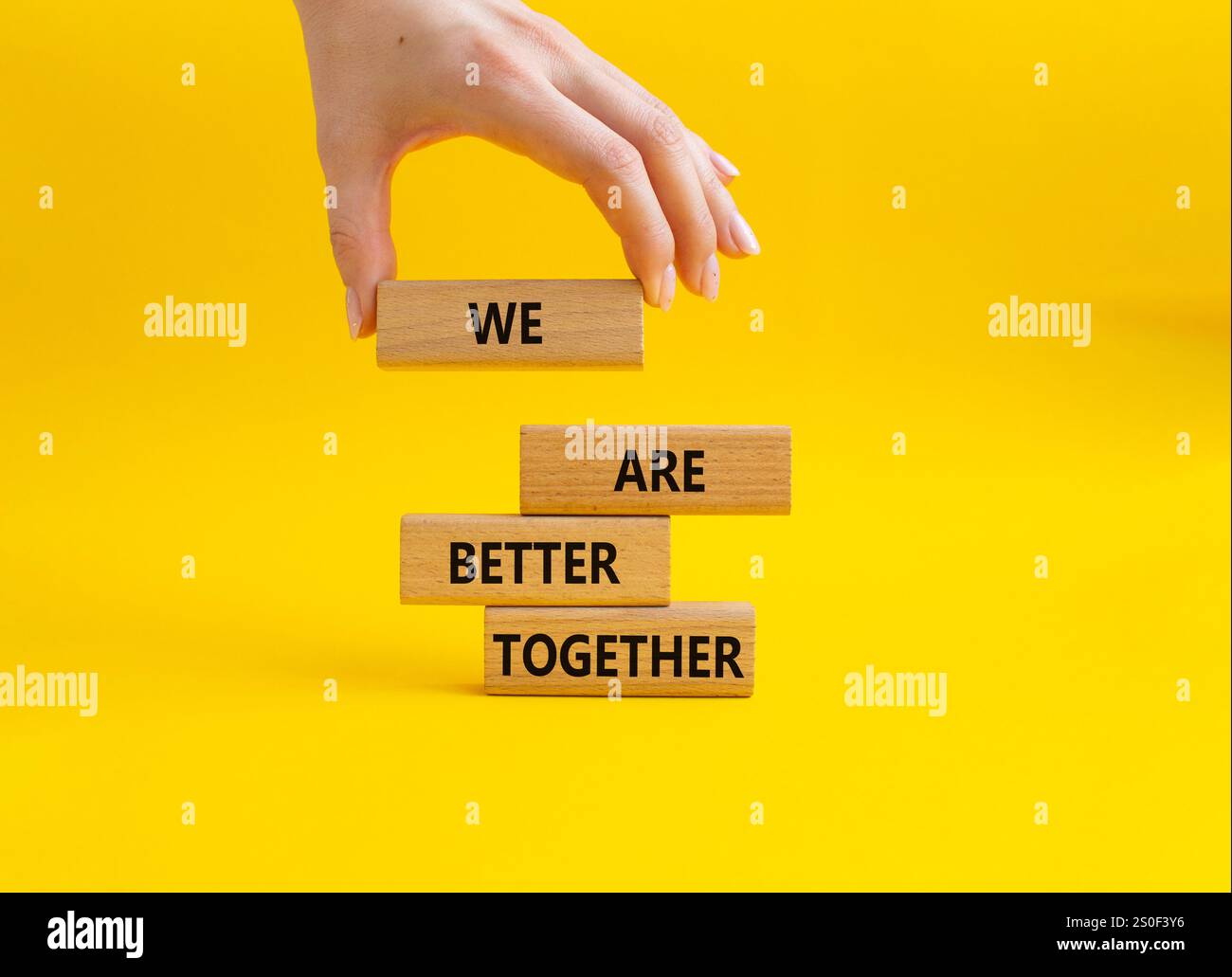 We are better together symbol. Wooden blocks with words We are better ...