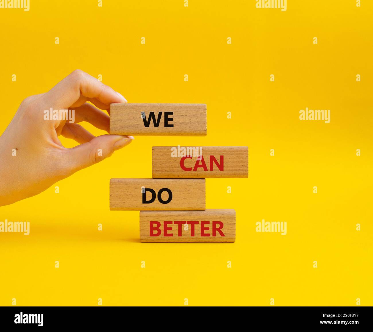 We Can Do Better symbol. Concept words We Can Do Better on wooden blocks. Beautiful yellow ...