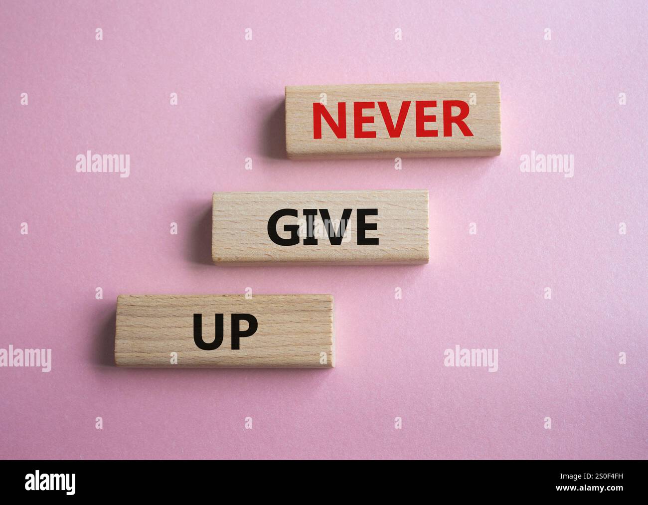 Never give up symbol. Concept words Never give up on wooden blocks ...