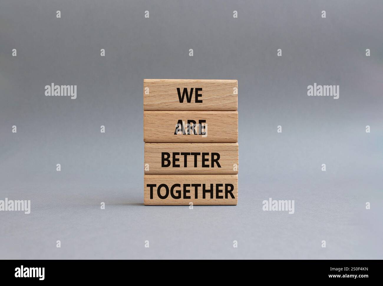 We are better together symbol. Wooden blocks with words We are better ...