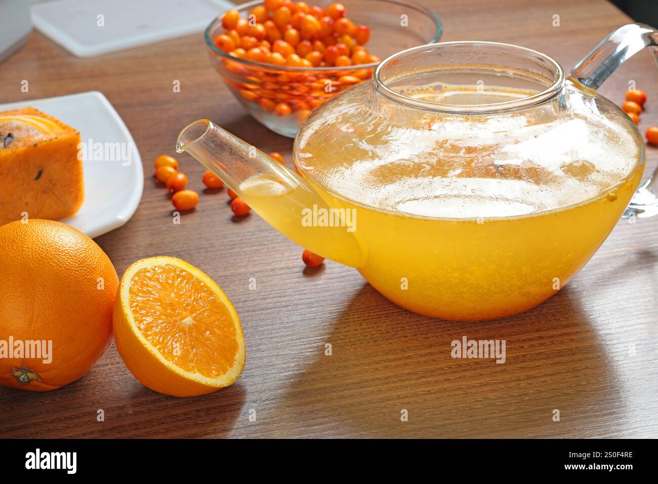 Tea made from frozen briquettes of sea buckthorn, orange and spices in ...