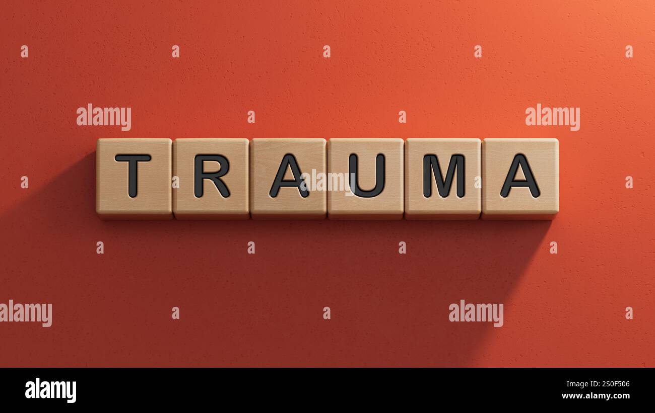 wooden cube block with TRAUMA business word.close up of wooden elements ...