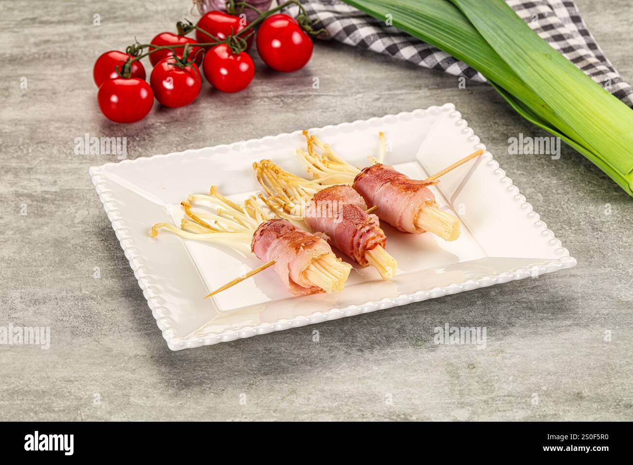 Grilled enoki mushroom with bacon roll wrap Stock Photo - Alamy