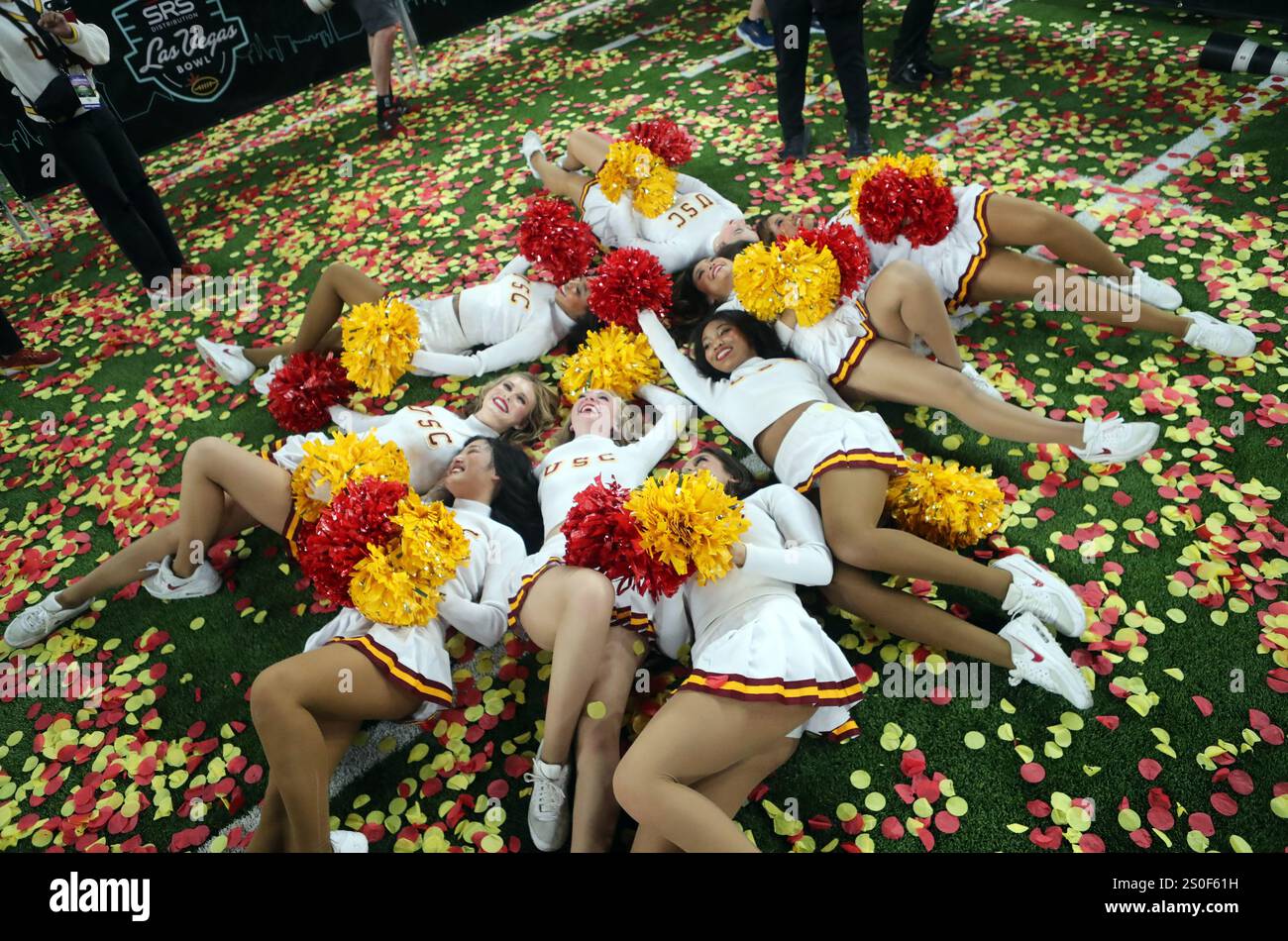 December 27, 2024 - USC Cheerleaders celebrate in the confetti after a ...