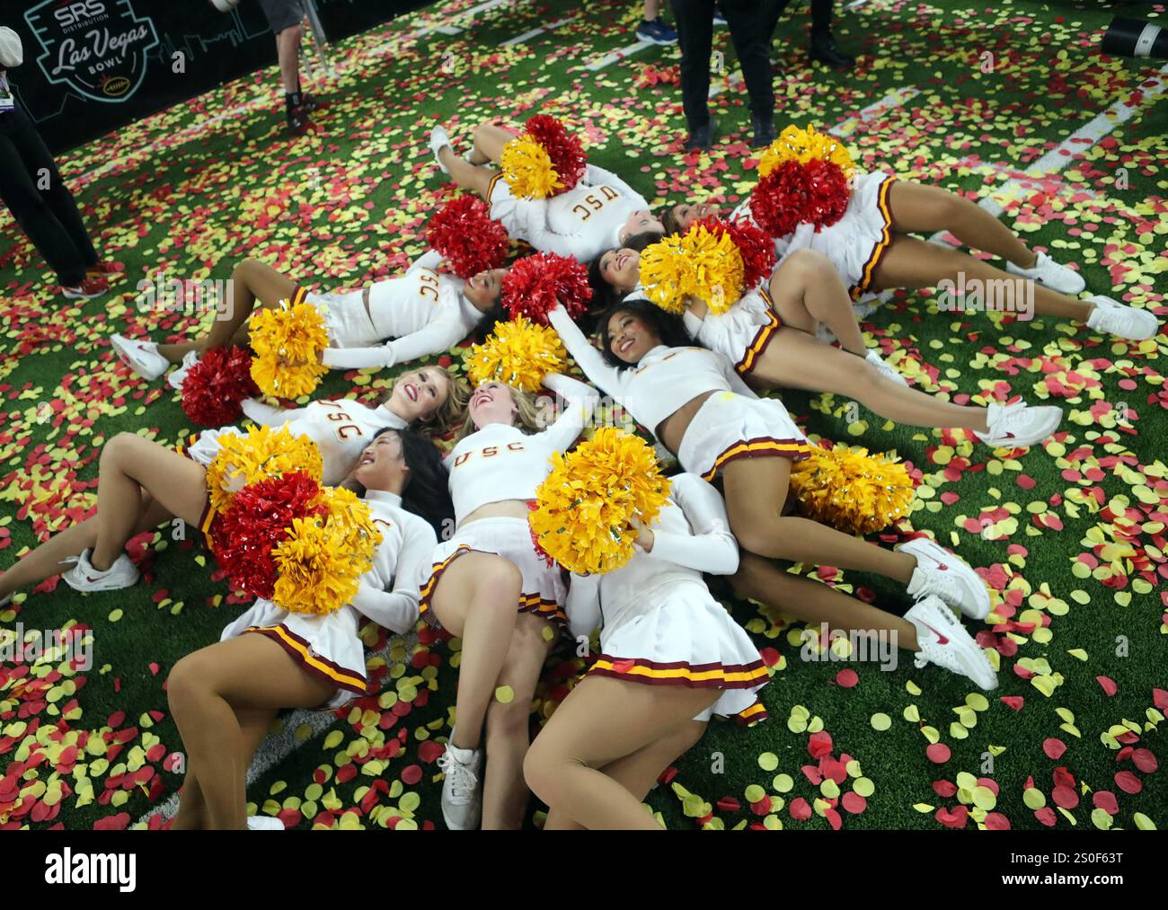 December 27, 2024 - USC Cheerleaders celebrate in the confetti after a ...