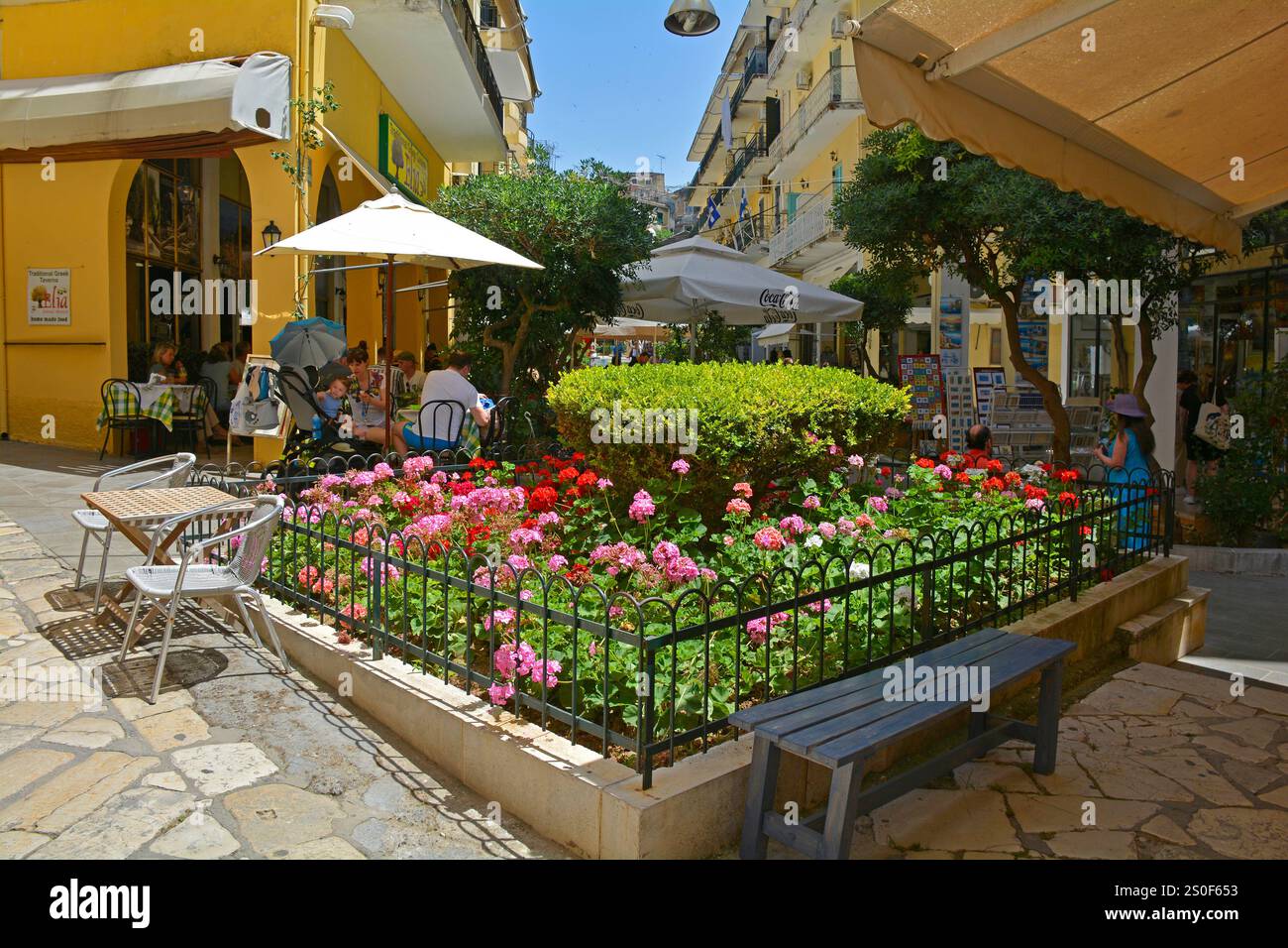 Corfu, Greece - June 6th 2024. A colourful flower bed in the historic ...