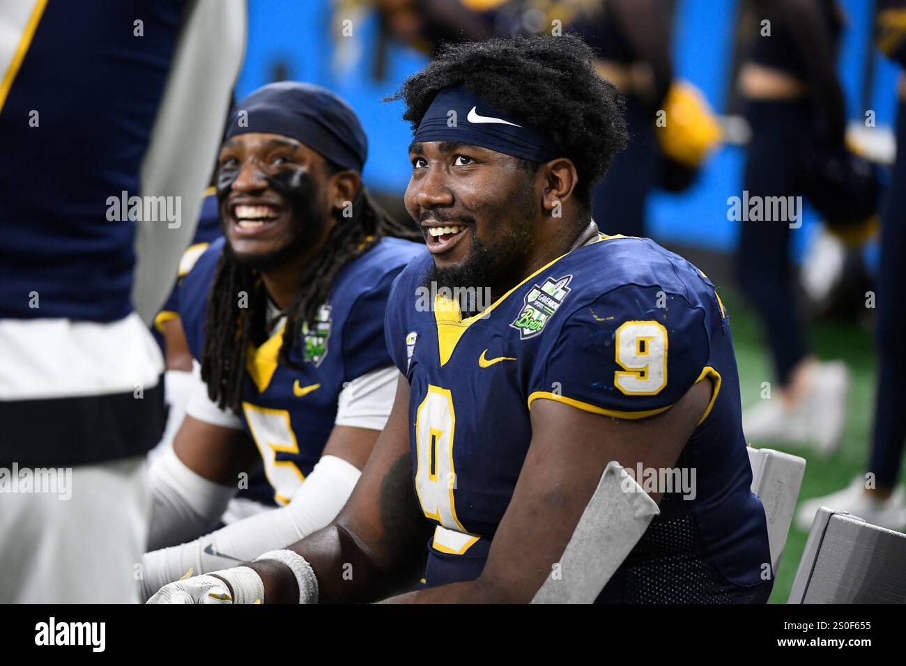 Toledo defensive tackle Darius Alexander (9) smiles during the second ...