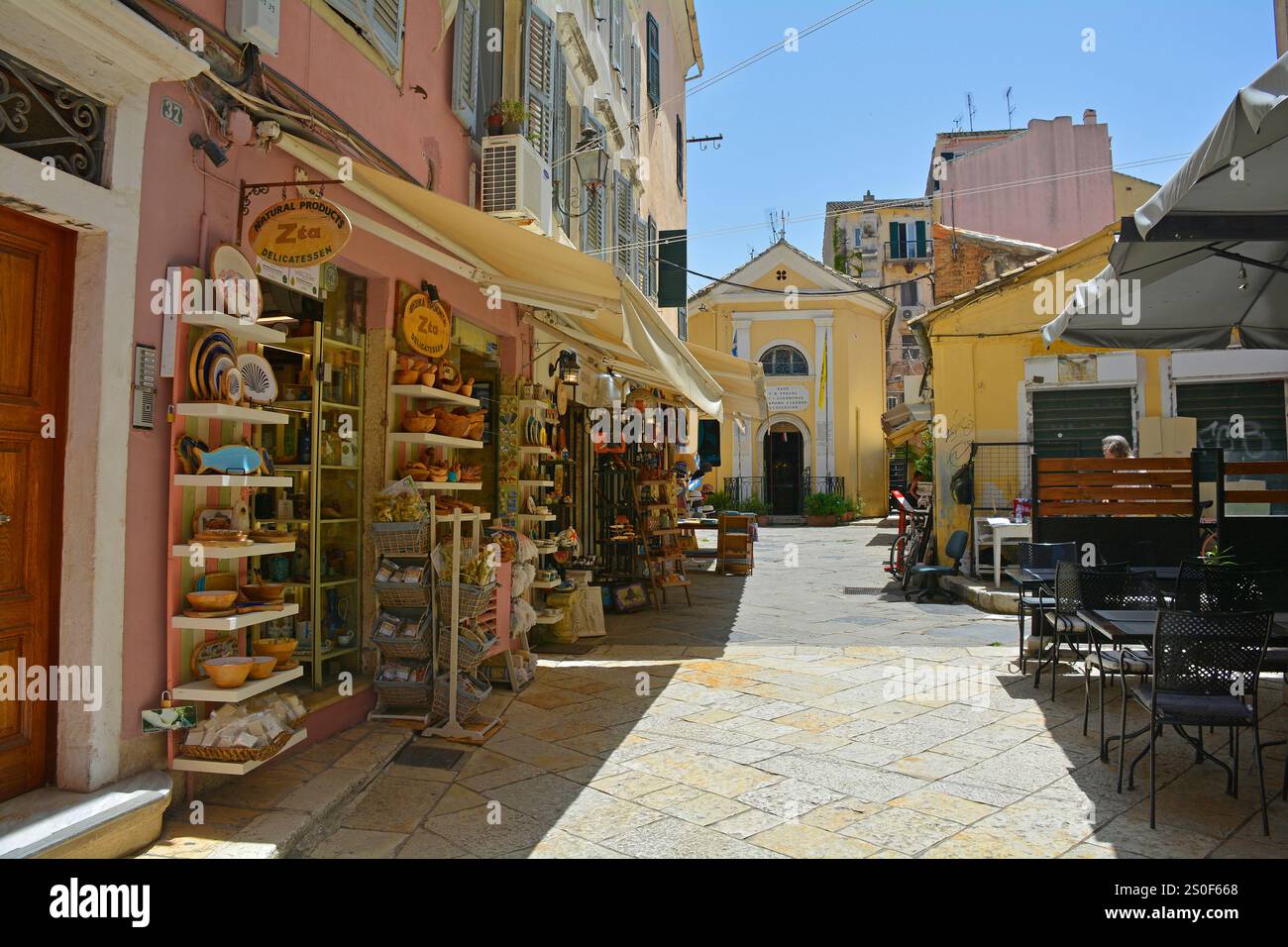 Corfu, Greece - June 6th 2024. Bars and shops selling gifts and ...