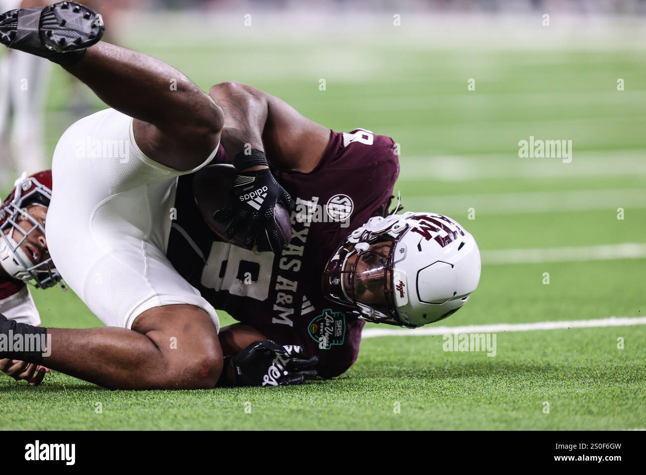 Las Vegas, NV, USA. 27th Dec, 2024. Texas A&M Aggies defensive lineman ...