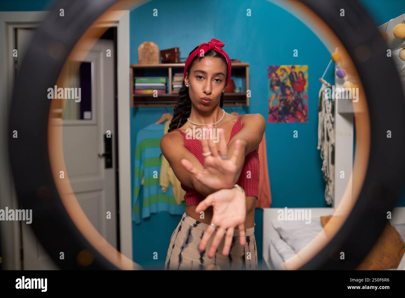 Gen Z Girl Dancing In Front Of Ring Lamp Stock Photo - Alamy