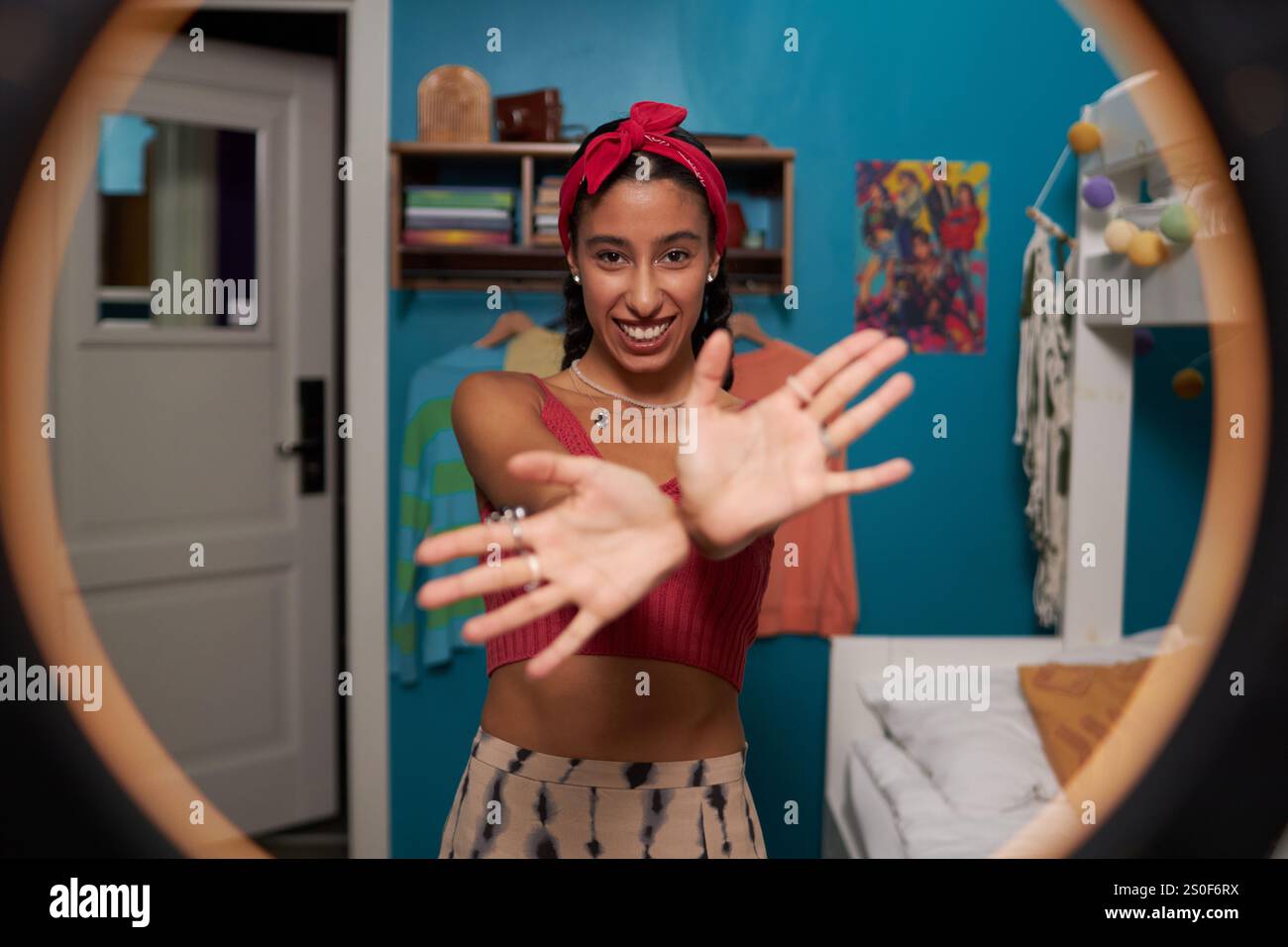 Biracial Female Influencer Dancing In Dorm Room Stock Photo - Alamy