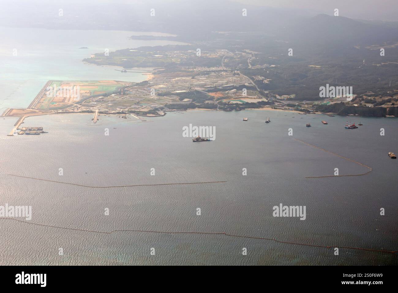 An aerial photo shows the work to improve the soft ground at Oura Bay ...