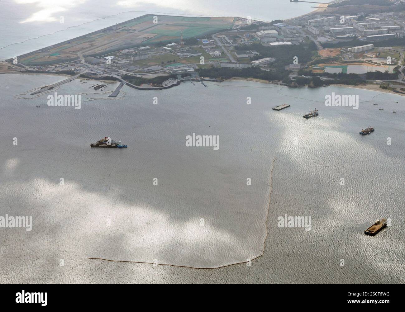 An aerial photo shows the work to improve the soft ground at Oura Bay ...