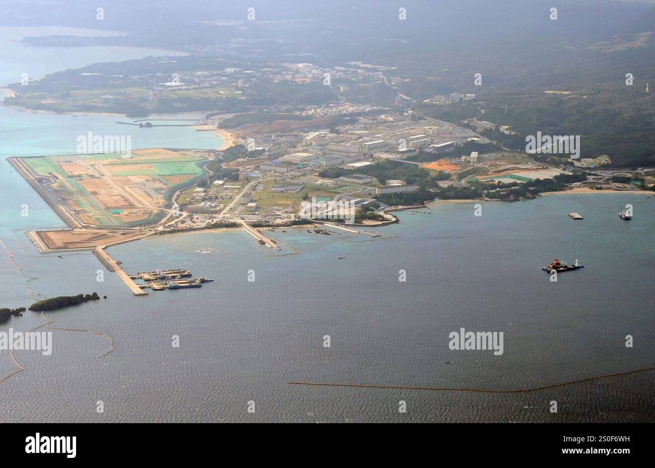 An aerial photo shows the work to improve the soft ground at Oura Bay ...
