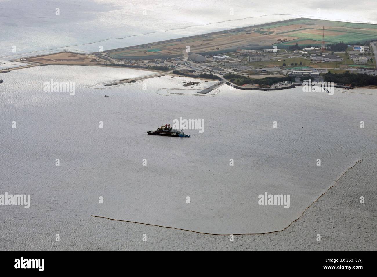 An aerial photo shows the work to improve the soft ground at Oura Bay ...