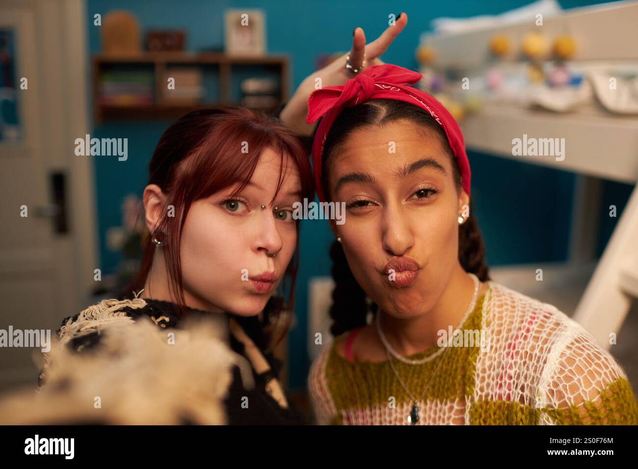 Joyful Girls Making Funny Faces While Taking Selfies Stock Photo - Alamy