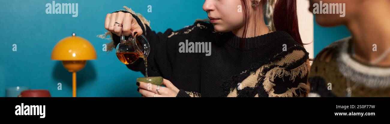 Female Student Pouring Tea Into Piyala Header Stock Photo - Alamy