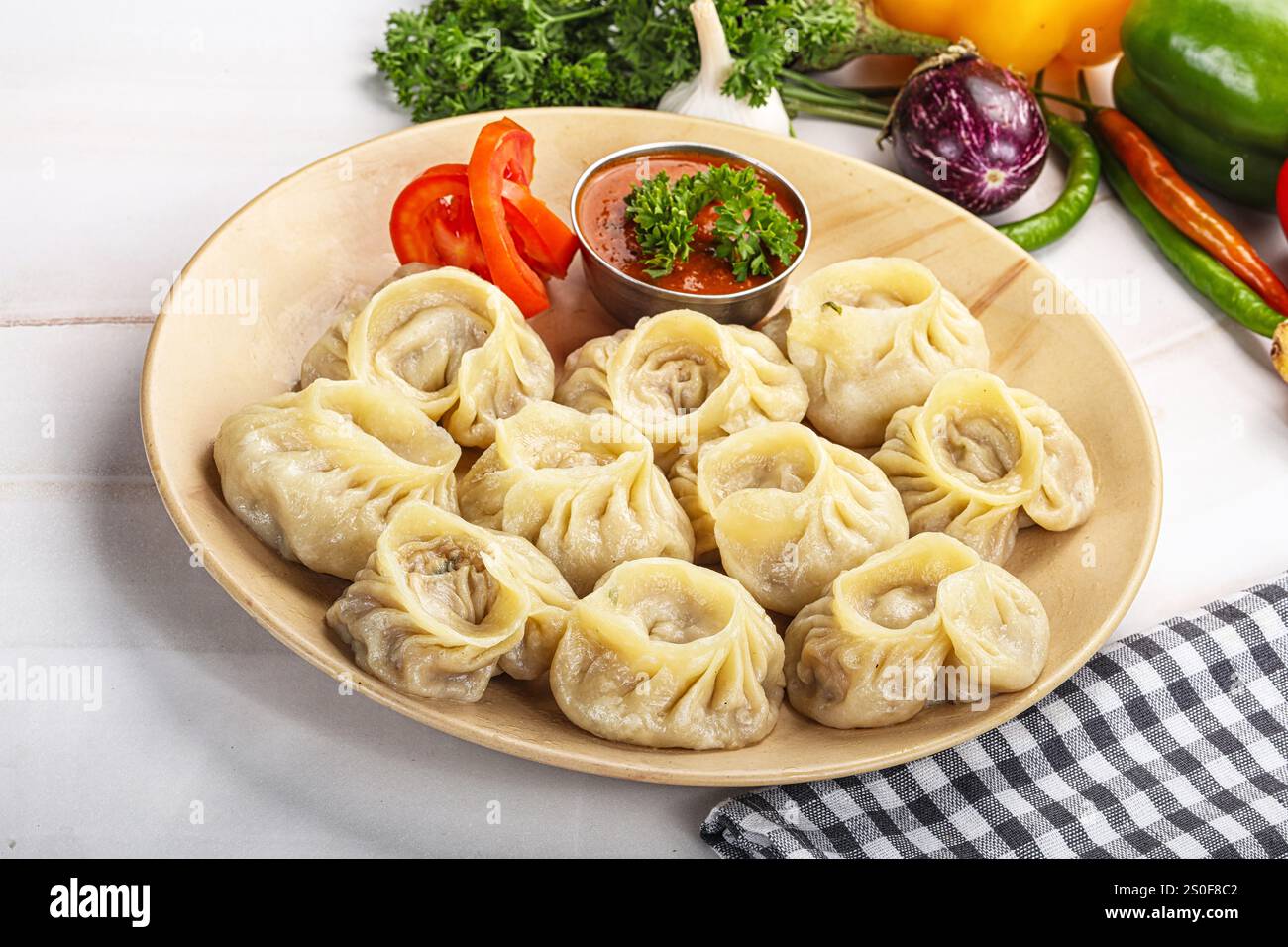 Steamed Nepali dumpling Momo with sauce stuffed chicken, meat, seafood ...