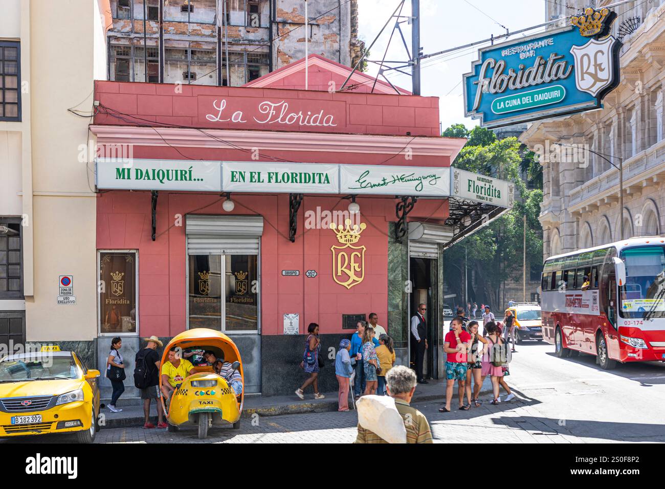 Tourists at Ernest Hemingway's favourite bar, El Floridita in Havana ...