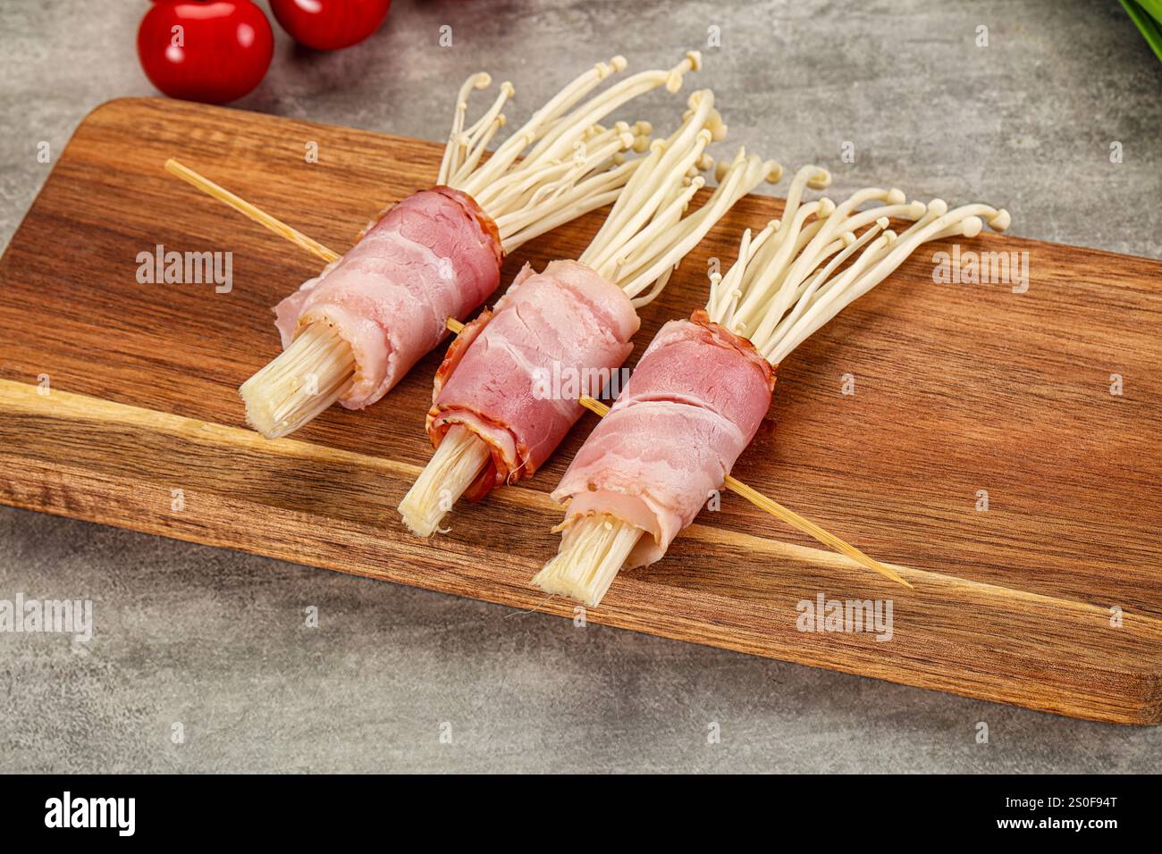 Raw roll with enoki mushroom and bacon Stock Photo - Alamy