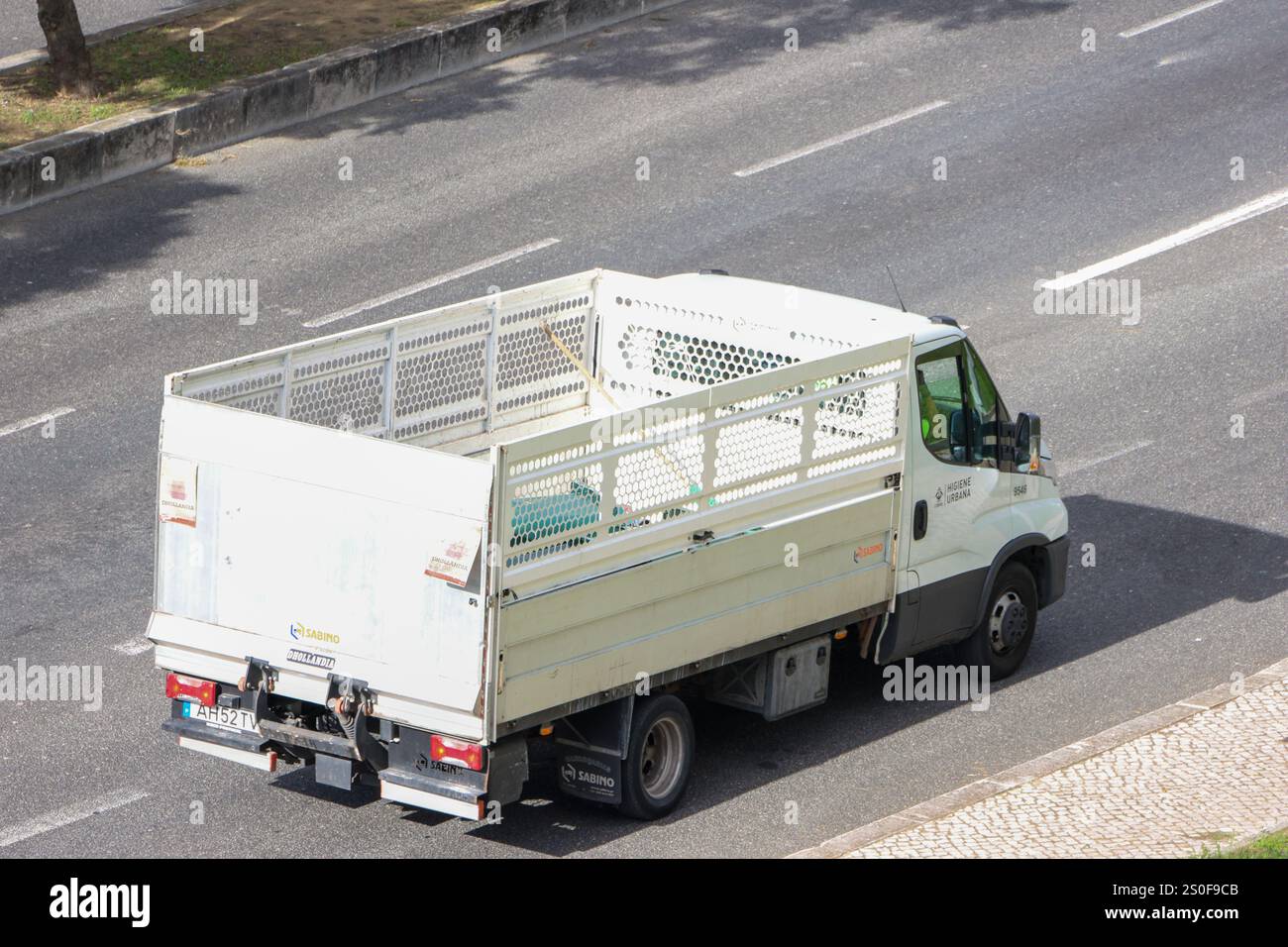 White iveco daily cab chassis truck driving on a multi lane road Stock ...