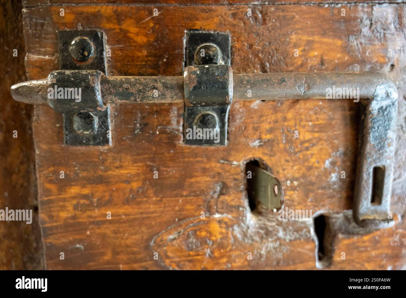 Ancient wooden door lock in a castle in Italy Stock Photo - Alamy