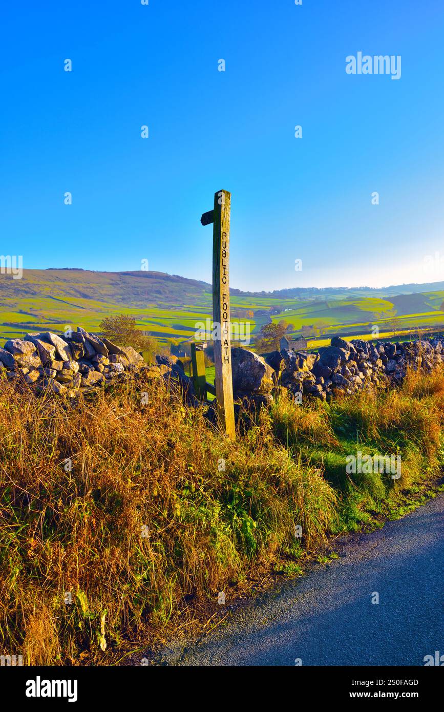 A sunny view of a footpath sign in the Peak District, Derbyshire ...