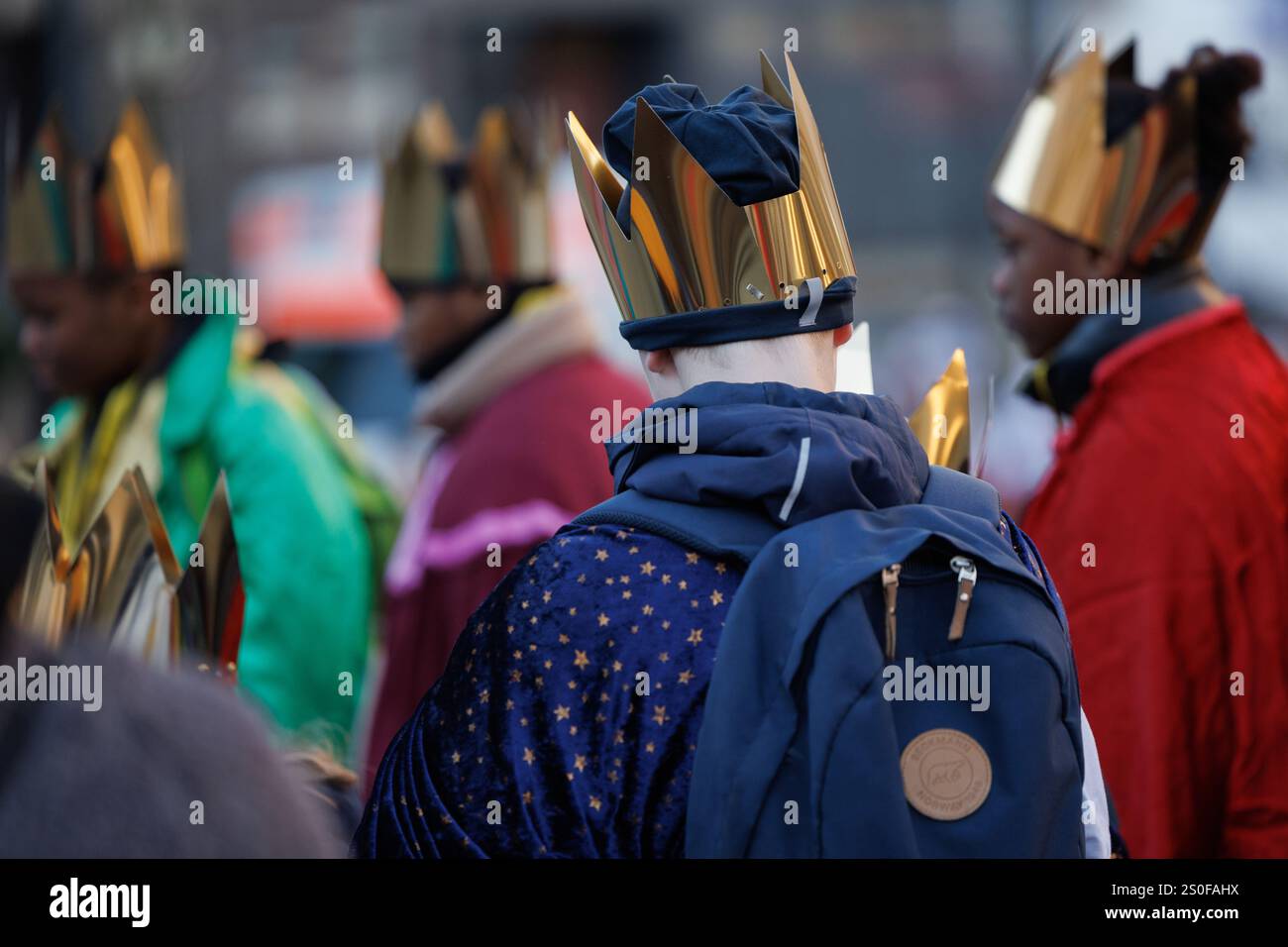 Paderborn, Germany. 28th Dec, 2024. Carol singers stand together. At ...