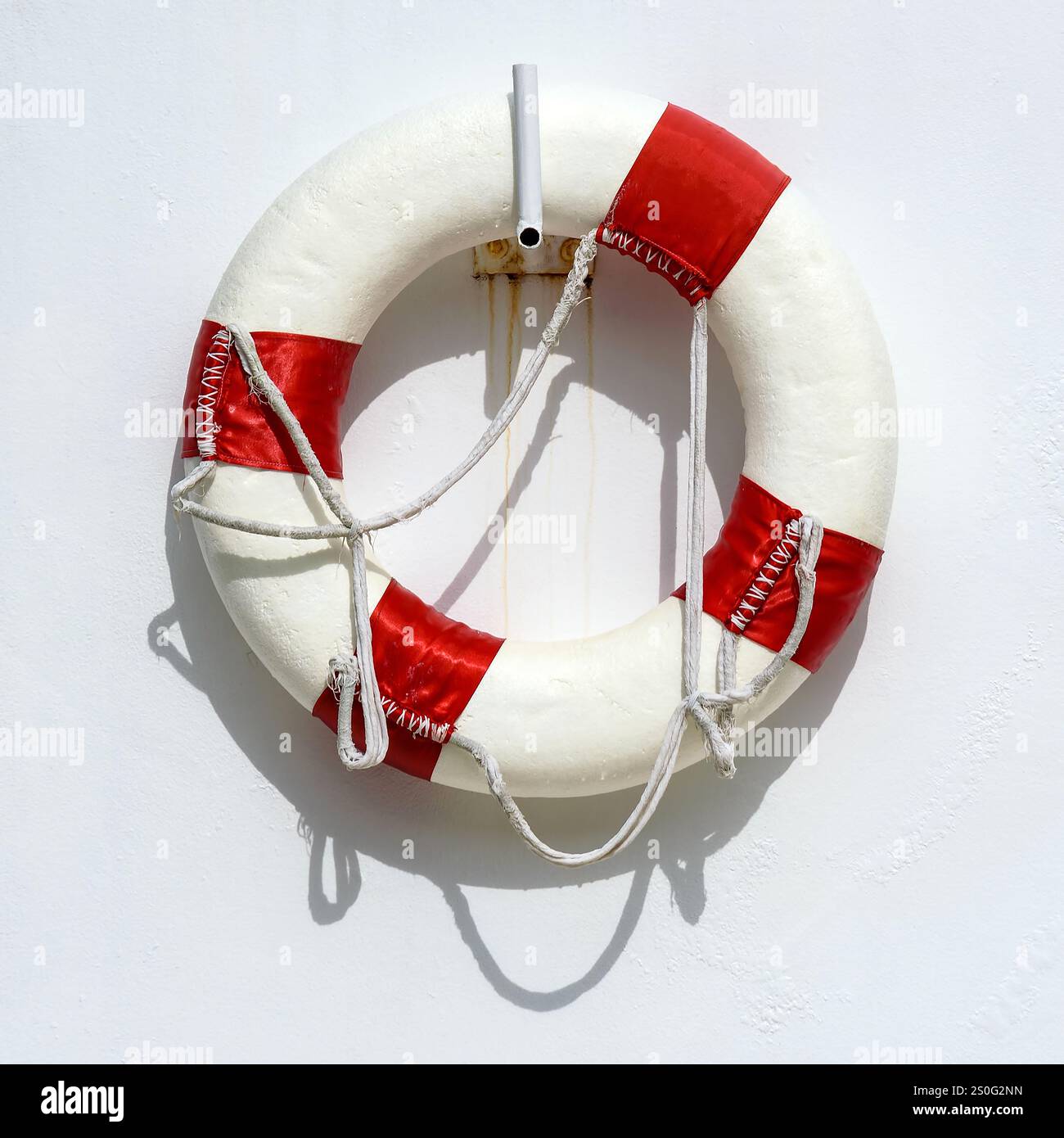 life preserver on the white wall Stock Photo - Alamy