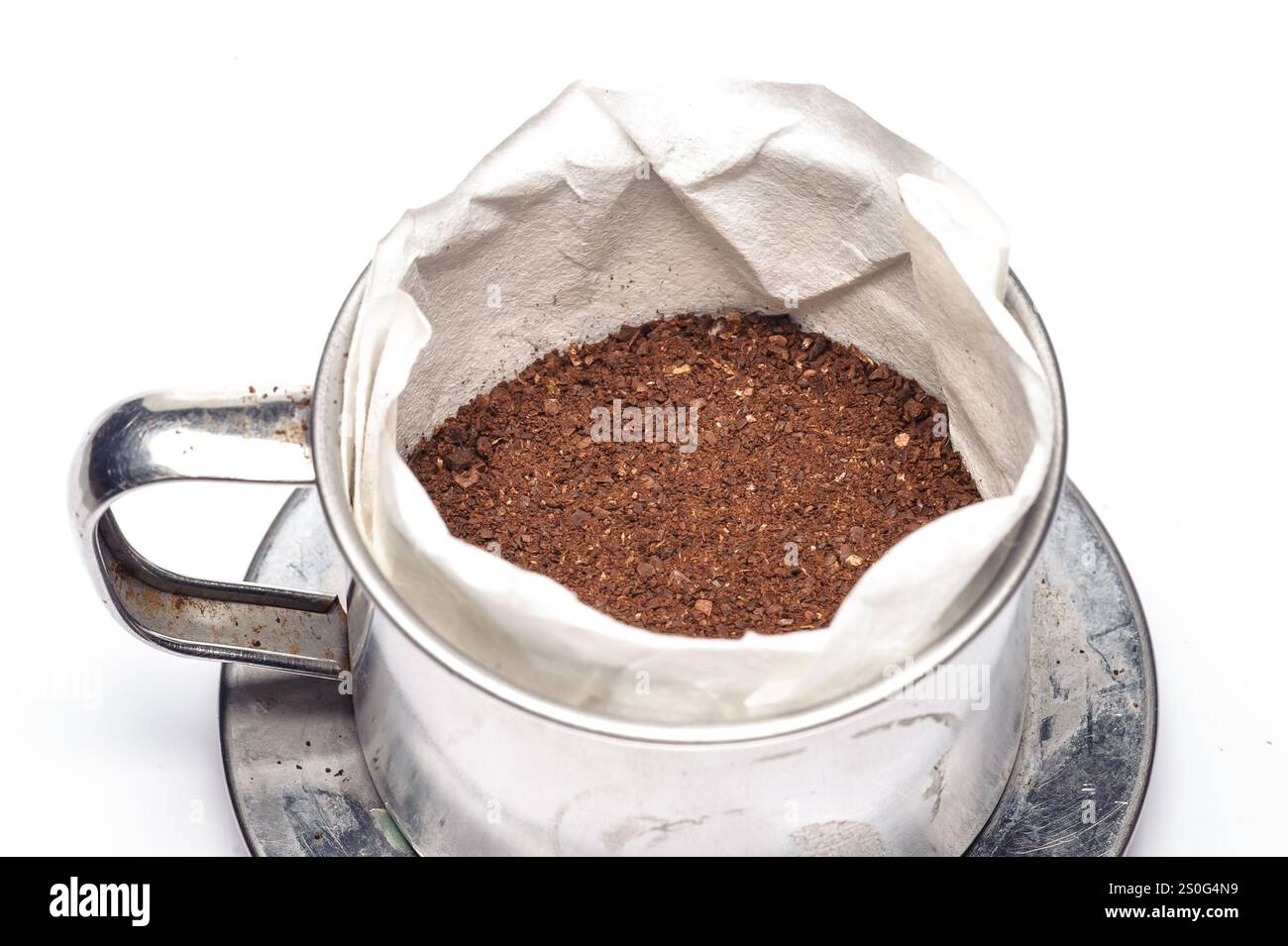 grounded coffee from the grinding machine on white background Stock ...
