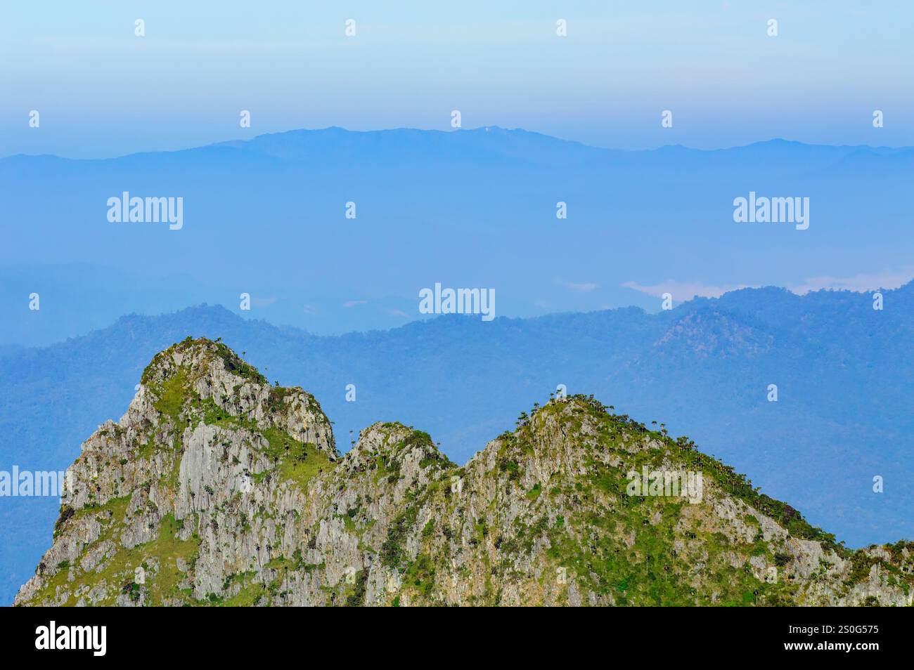 rocky grassland at top of the mountain with blue sky Stock Photo - Alamy