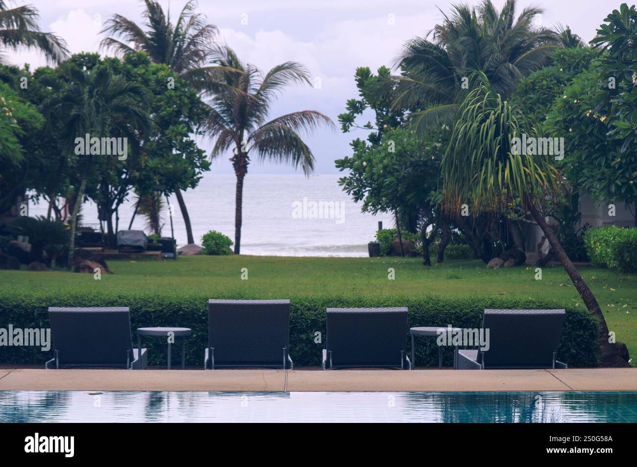 beach beds at seaside pool in the resort somewhere in Thailand Stock ...