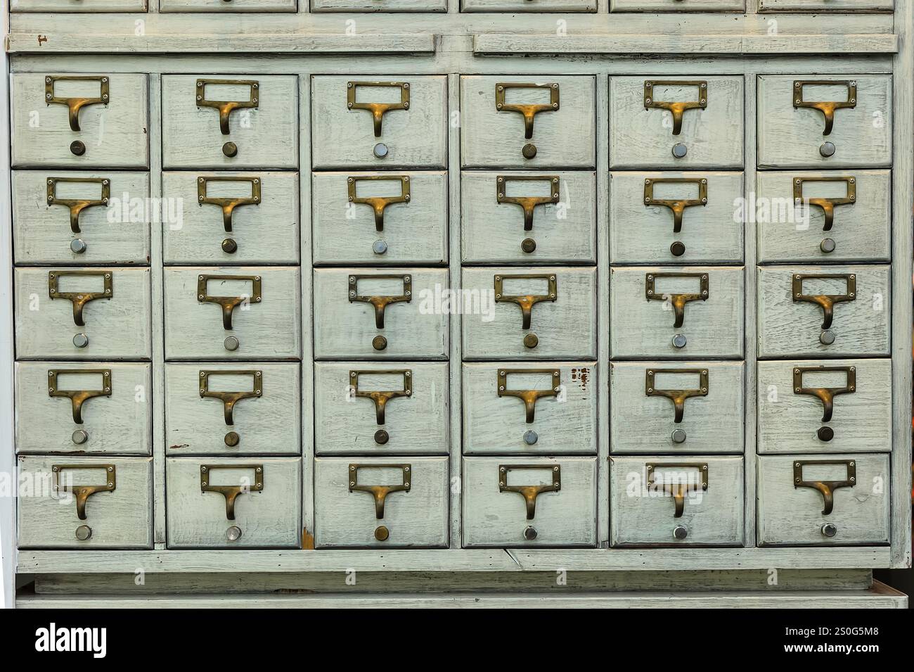 vintage green wood post drawer Stock Photo - Alamy