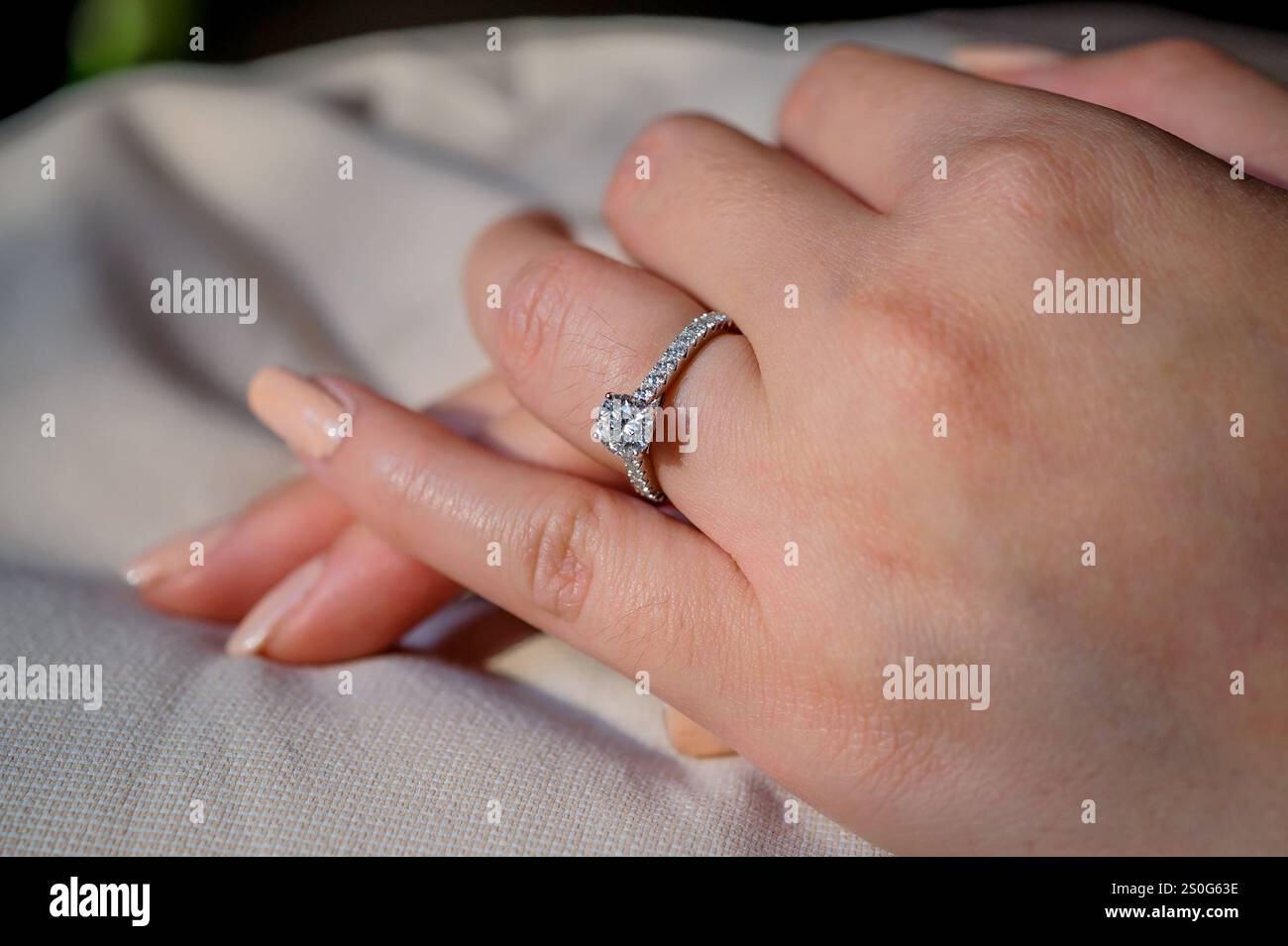 bridge and groom holding hands together show the wedding rings Stock ...