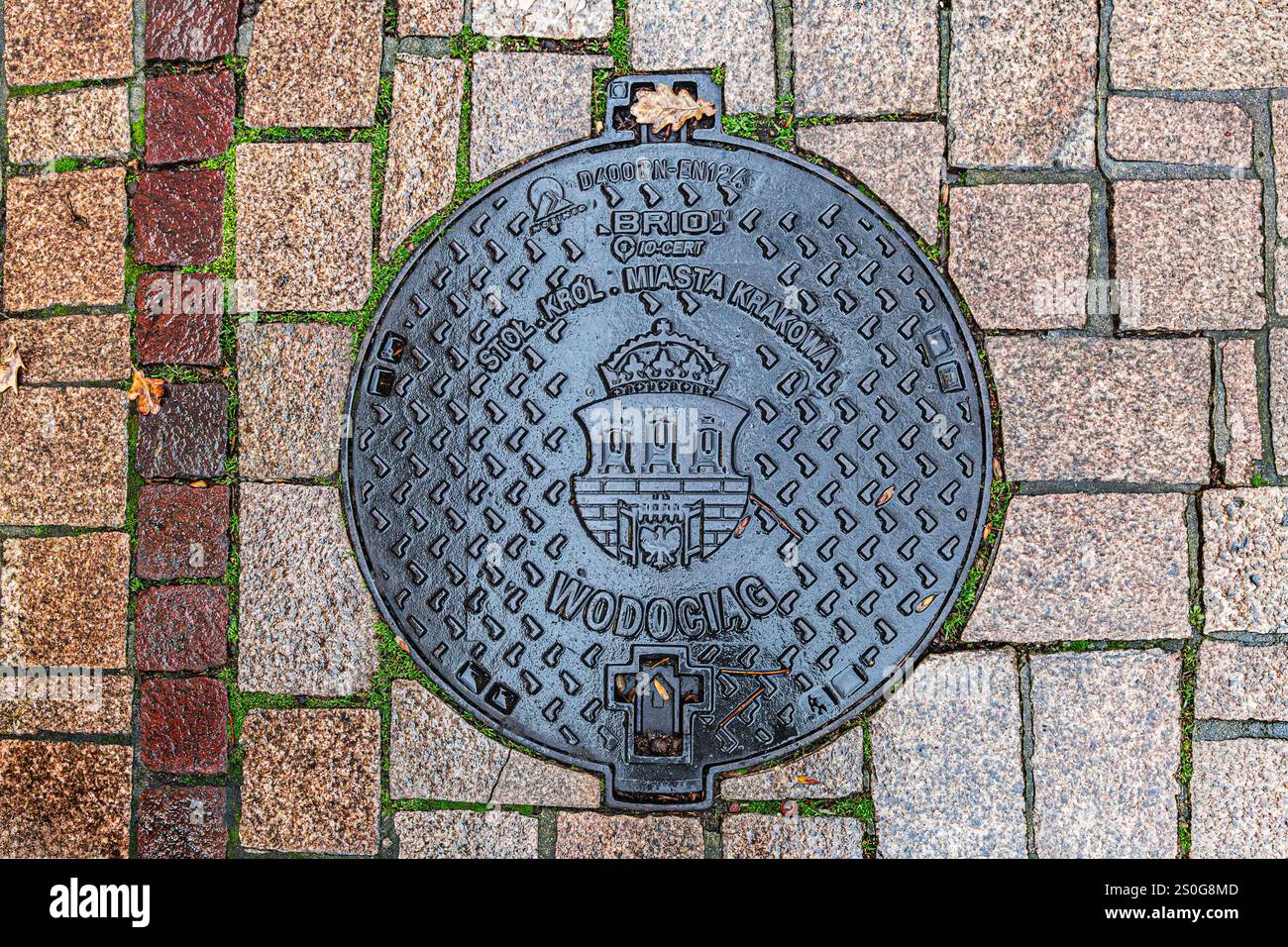 Emblem Beneath Your Feet: Kraków’s Historic Manhole Cover Design Stock ...