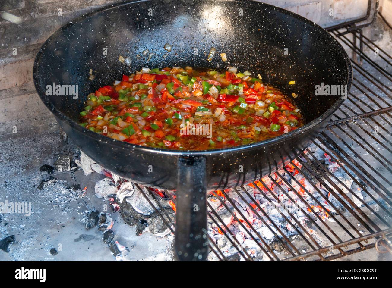 Preparing La Mancha or Castilian migas as a family where everyone eats ...