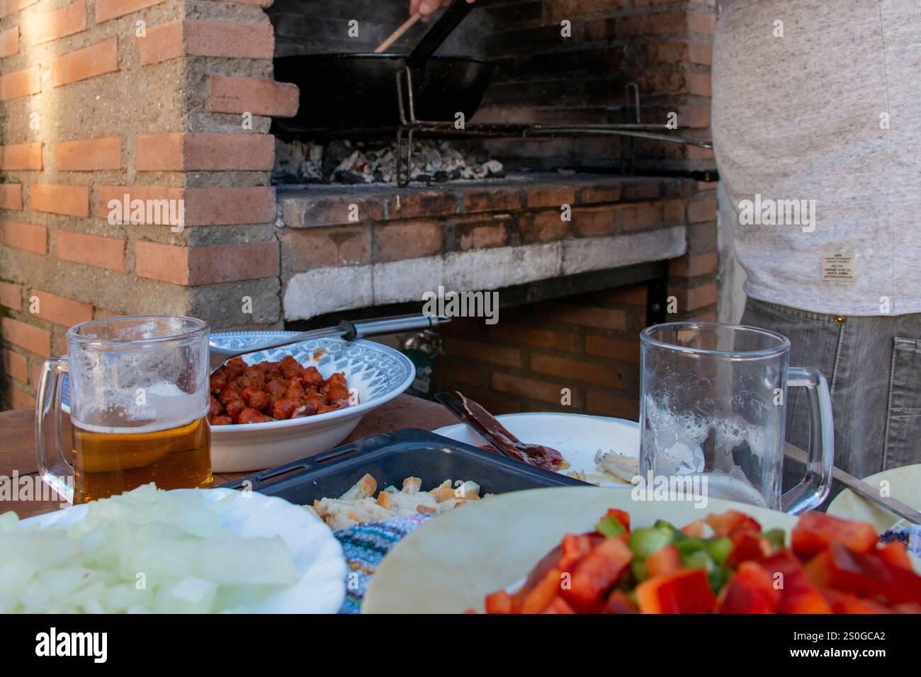 Preparing La Mancha or Castilian migas as a family where everyone eats ...