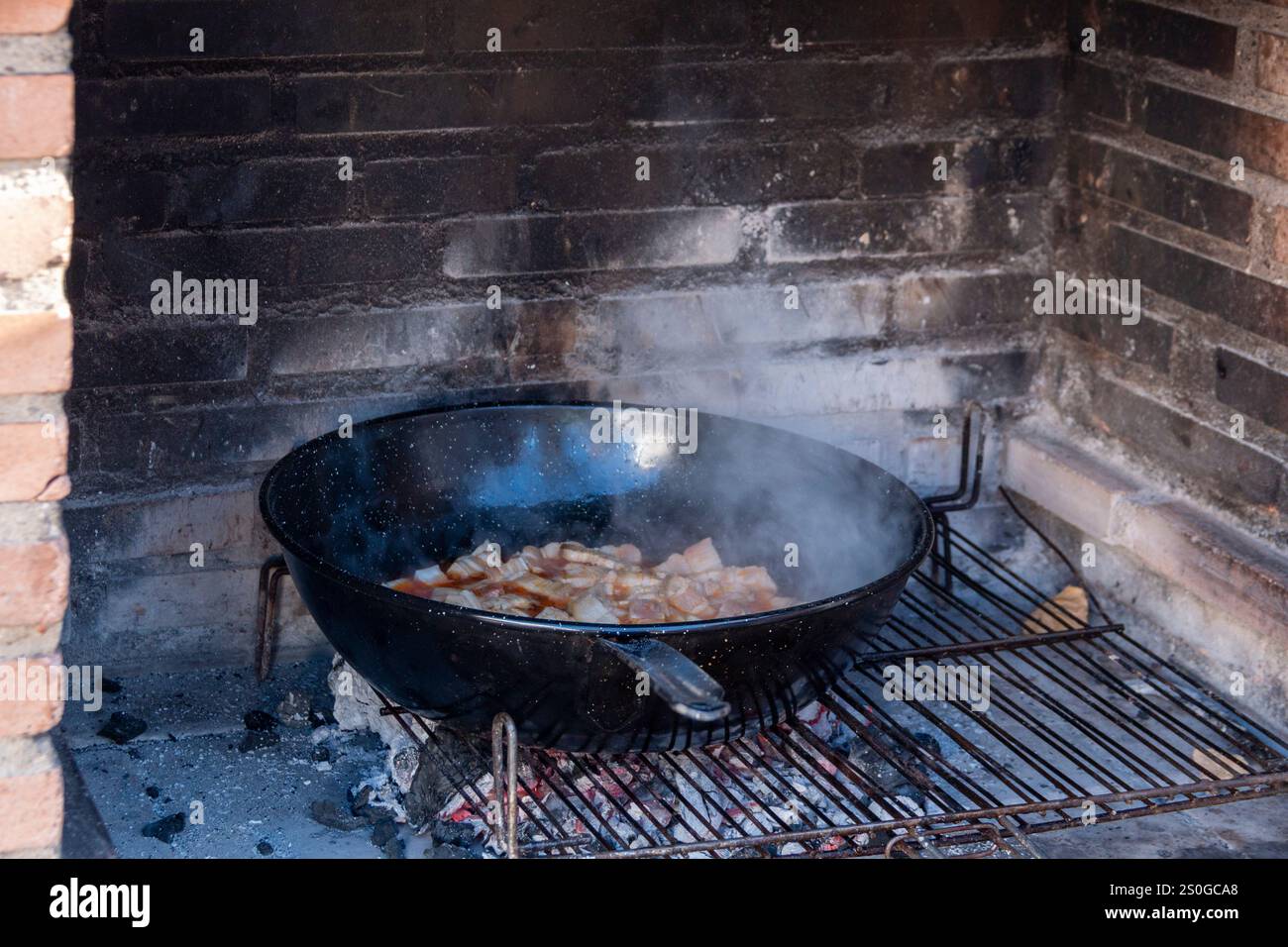 Preparing La Mancha or Castilian migas as a family where everyone eats ...