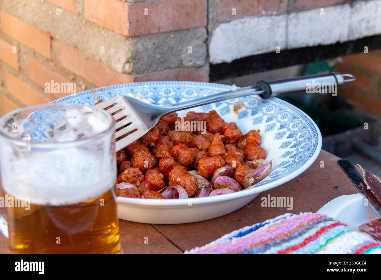 Preparing La Mancha or Castilian migas as a family where everyone eats ...