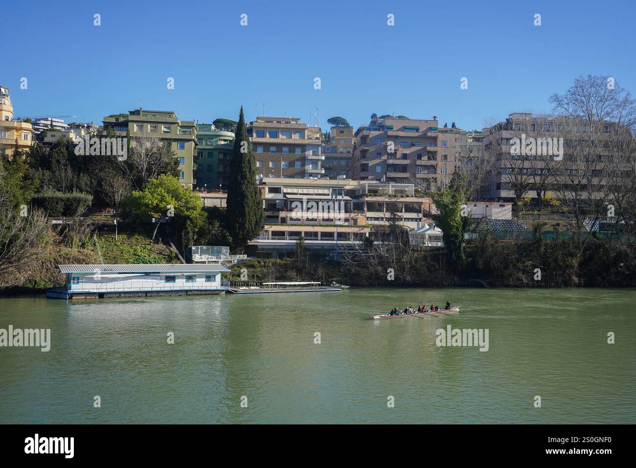 Rome, Italy. 28 December 2024 Rowing boats exercising in the warm ...