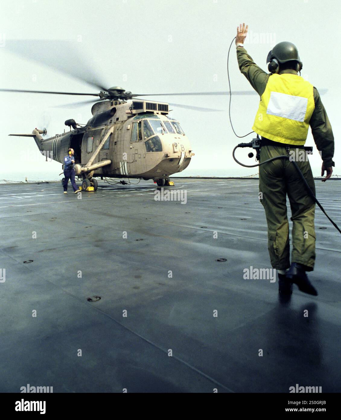 First Gulf War: 20th March 1991 An aircraft handler signals to an 845 ...