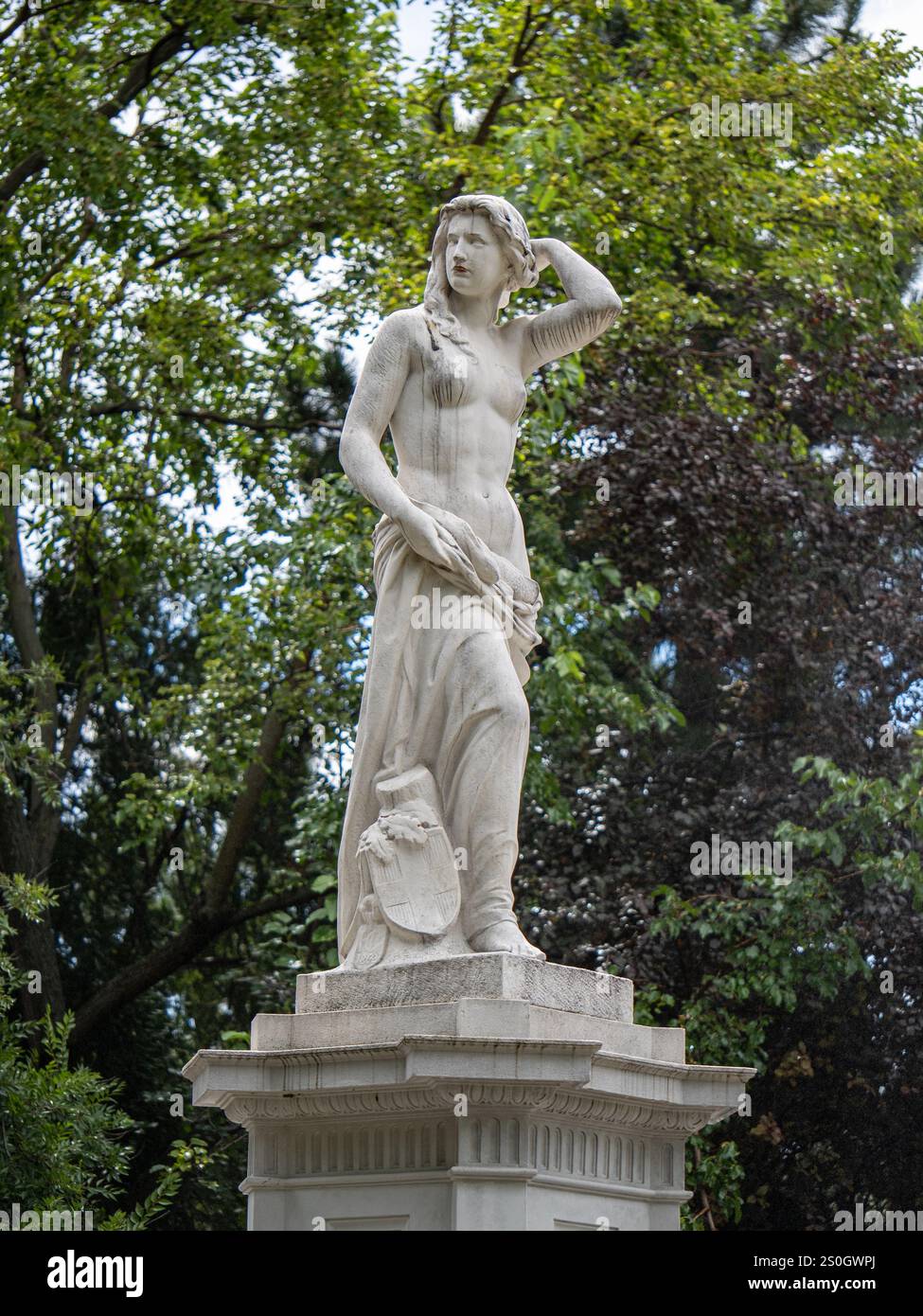 Classical Marble Maiden Sculpture Amidst Lush Greenery in Vienna's ...