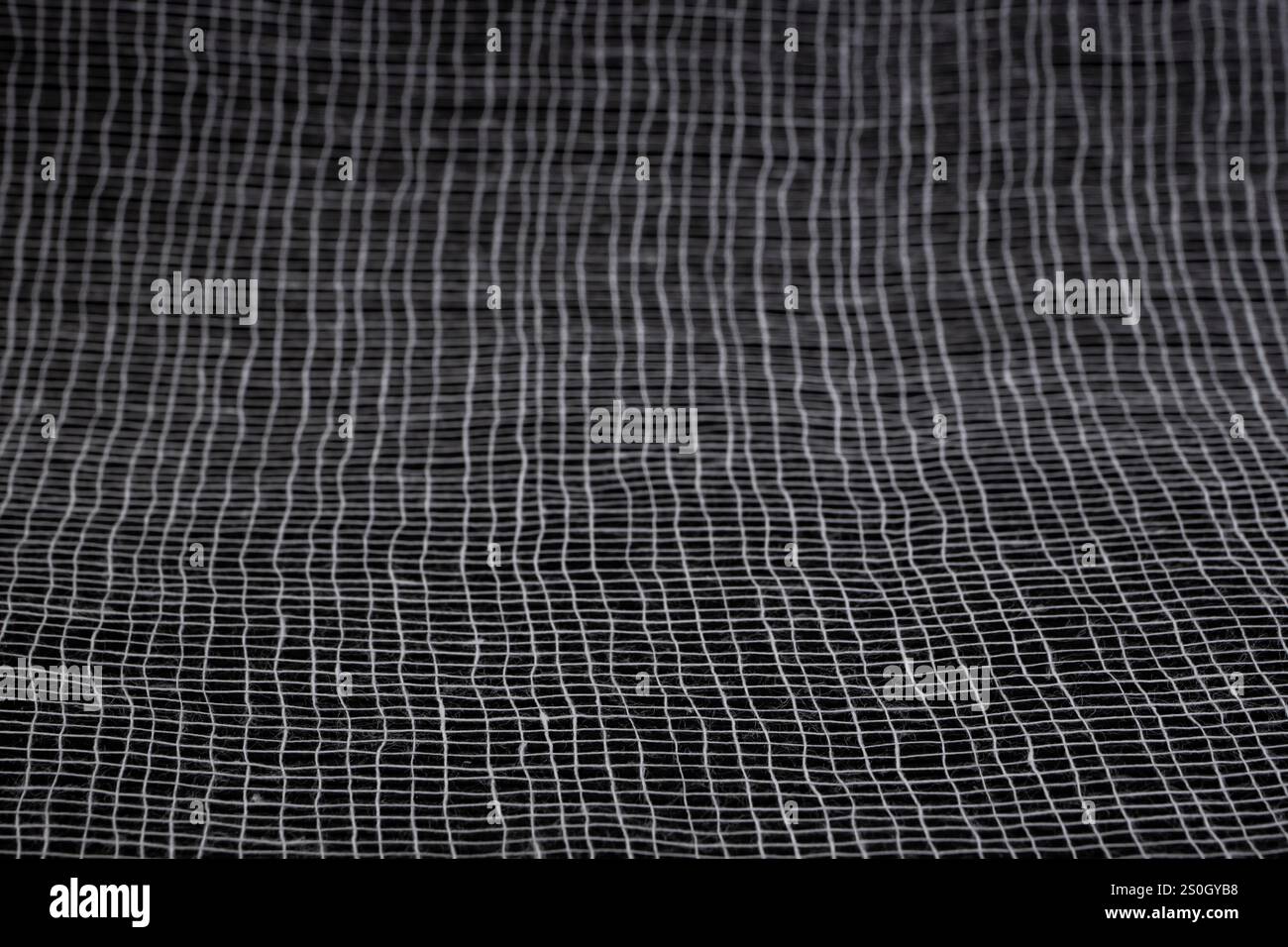 Textile bandage fabric side view close up on black background Stock ...