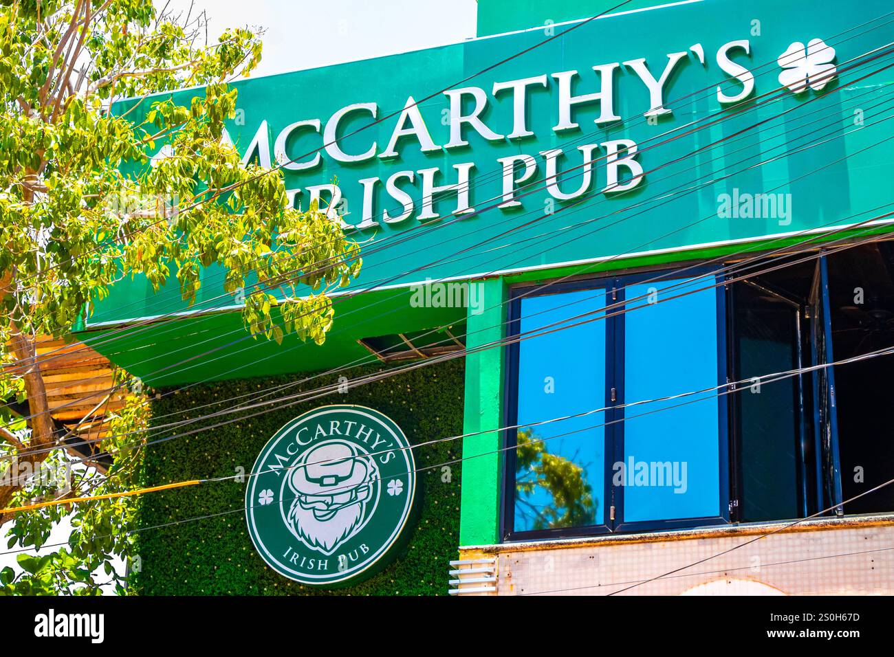 Sign entrance and information board at bar and Irish pub in Playa del ...
