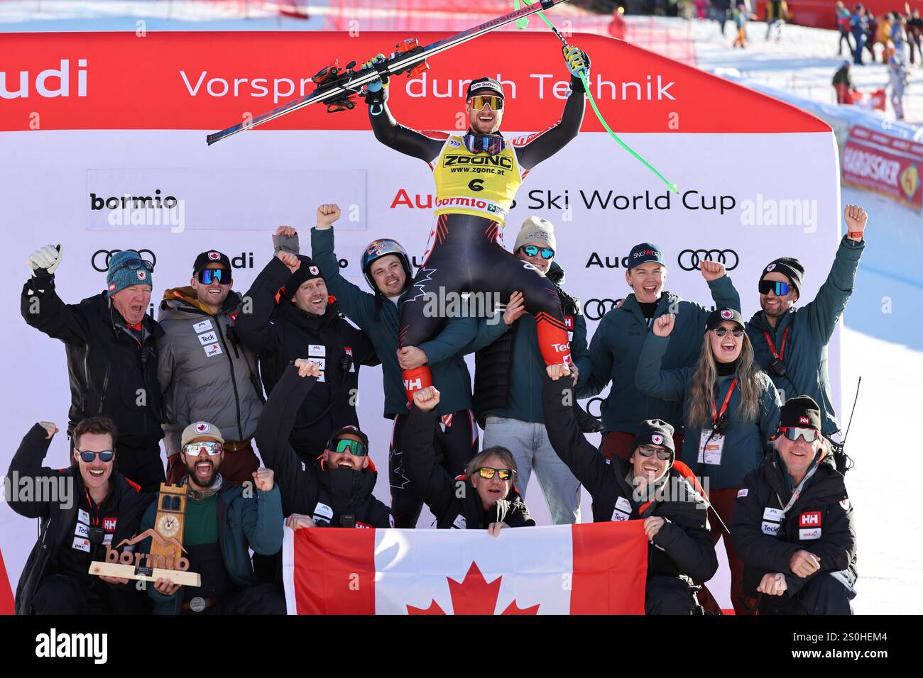 Third placed Canada's Cameron Alexander celebrates with the team after ...