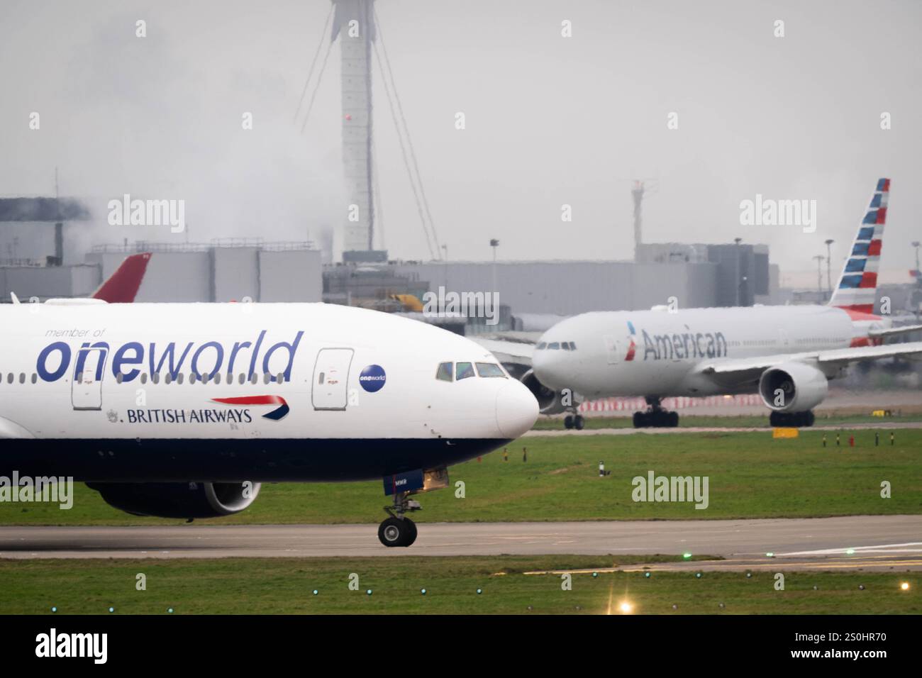 A British Airways Boeing B777-200ER and an American Airlines Boeing ...