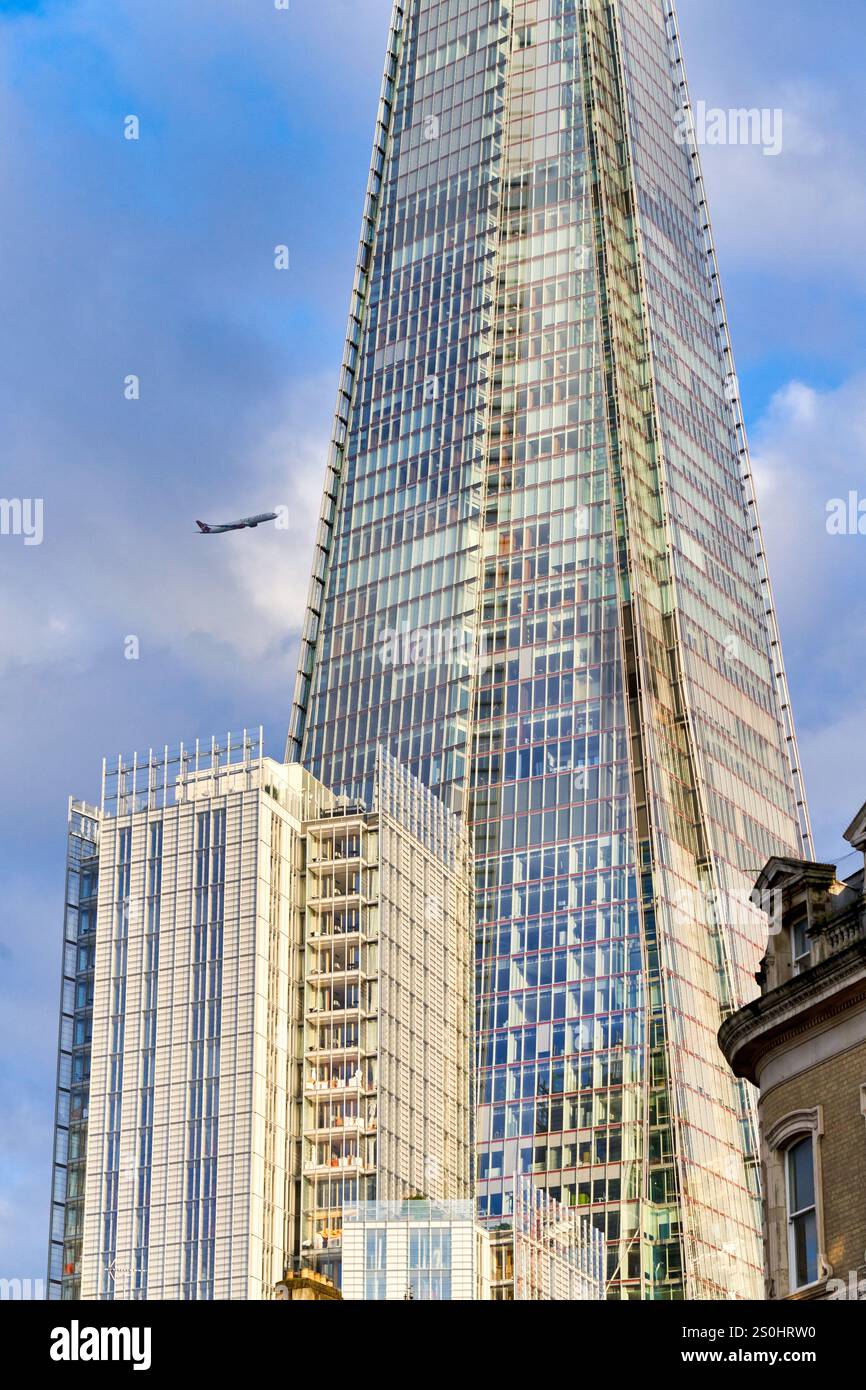 Plane, The Shard, Buildings of the financial district, London, England ...