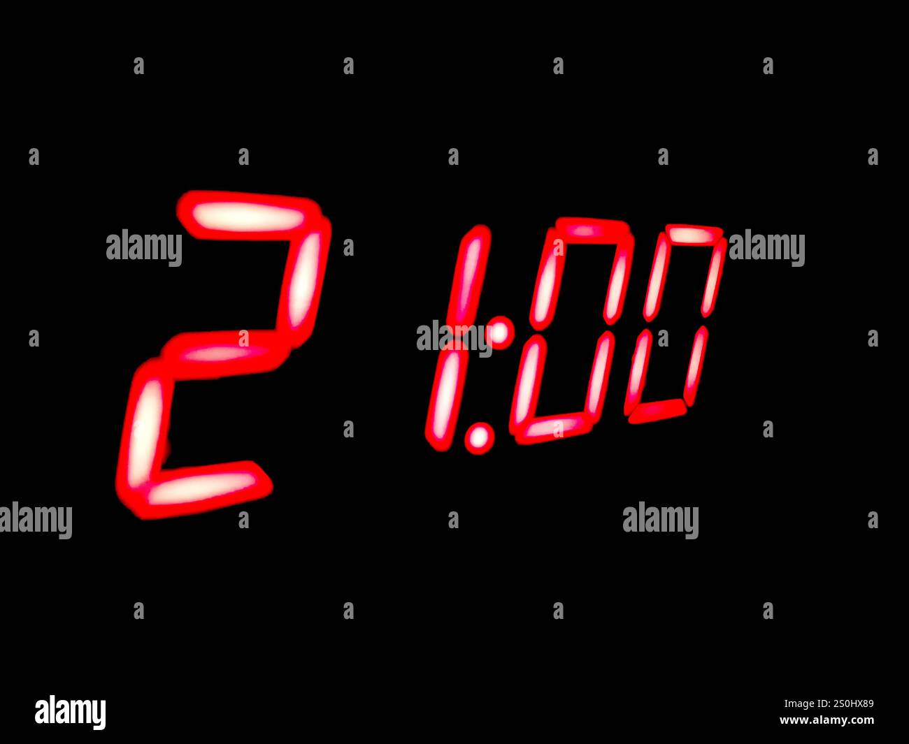 A digital clock face showing the time in red numbers on a black ...