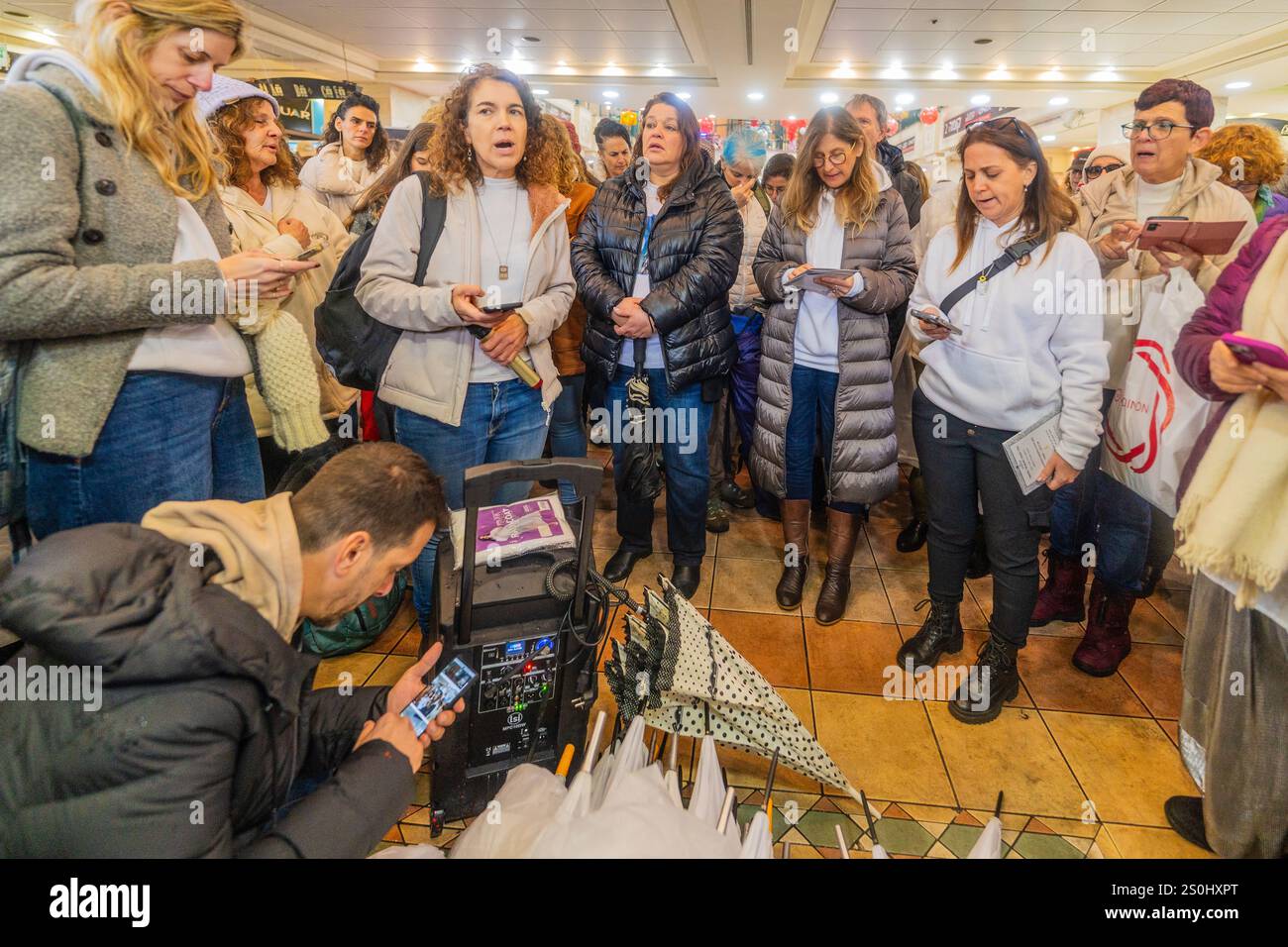 Haifa, Israel - December 27, 2024: People dressed in white and hostage ...